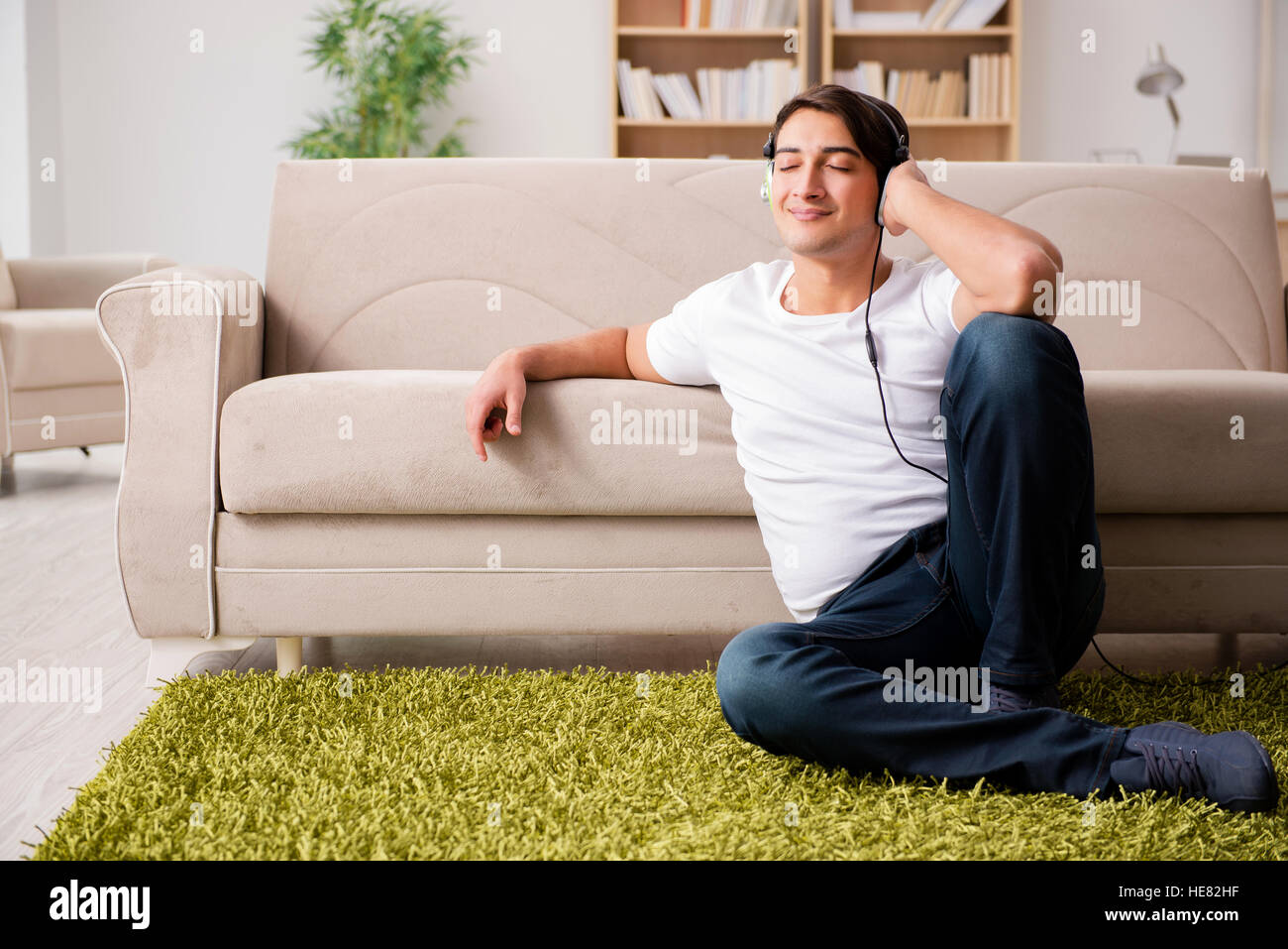 Handsome man listening to the music Stock Photo - Alamy