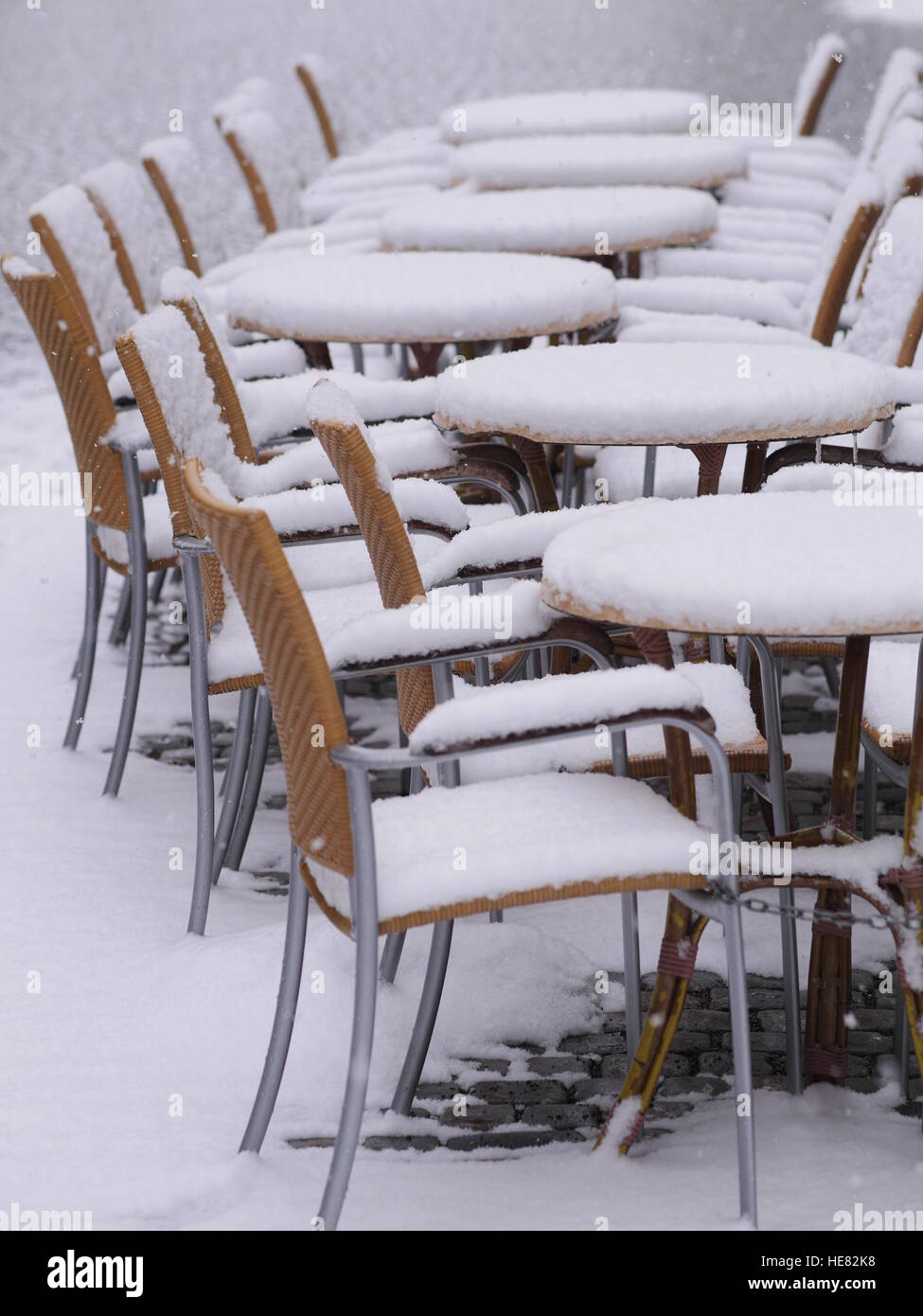 snowy chairs tables winter Stock Photo - Alamy