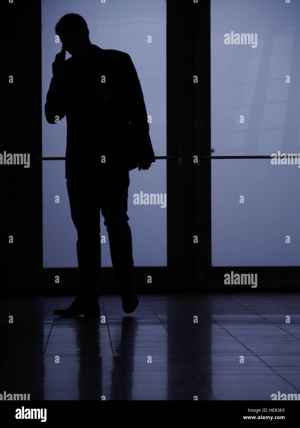 silhouette man phoning Stock Photo - Alamy