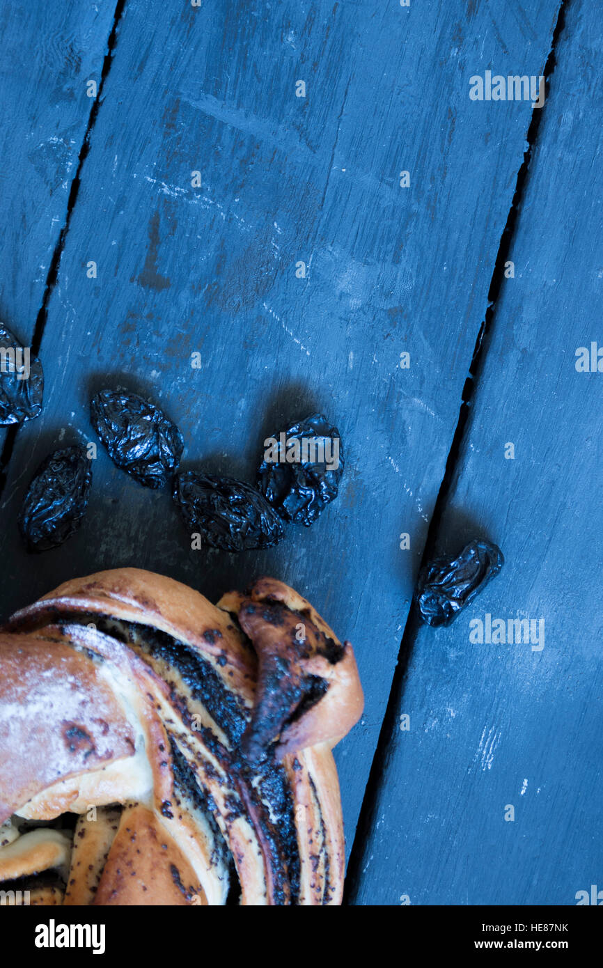 Delicious breakfast prunes on a dark background, toned Stock Photo - Alamy