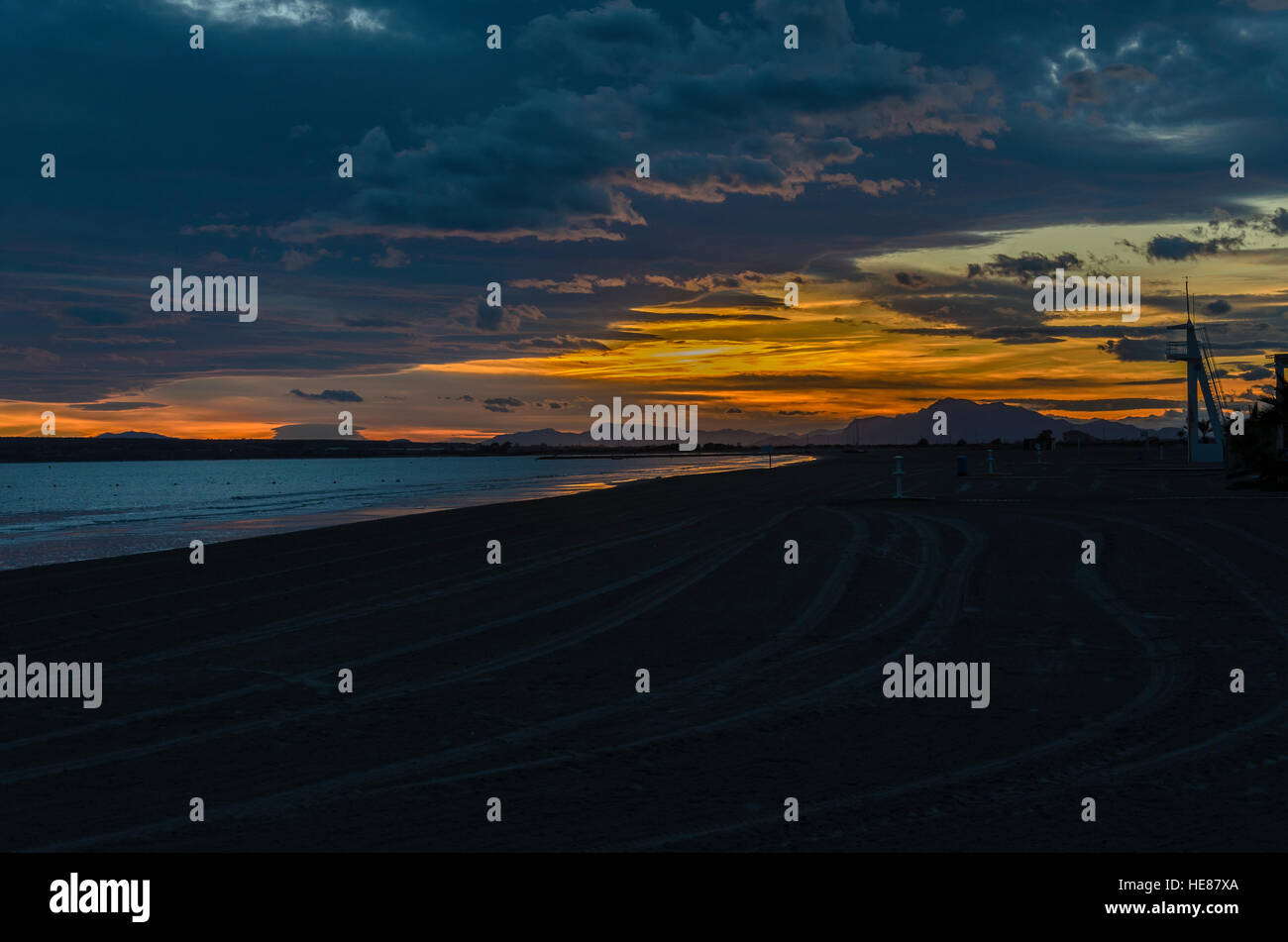 View of Playa Lisa beach in the evening with clouds, Alicante province ...