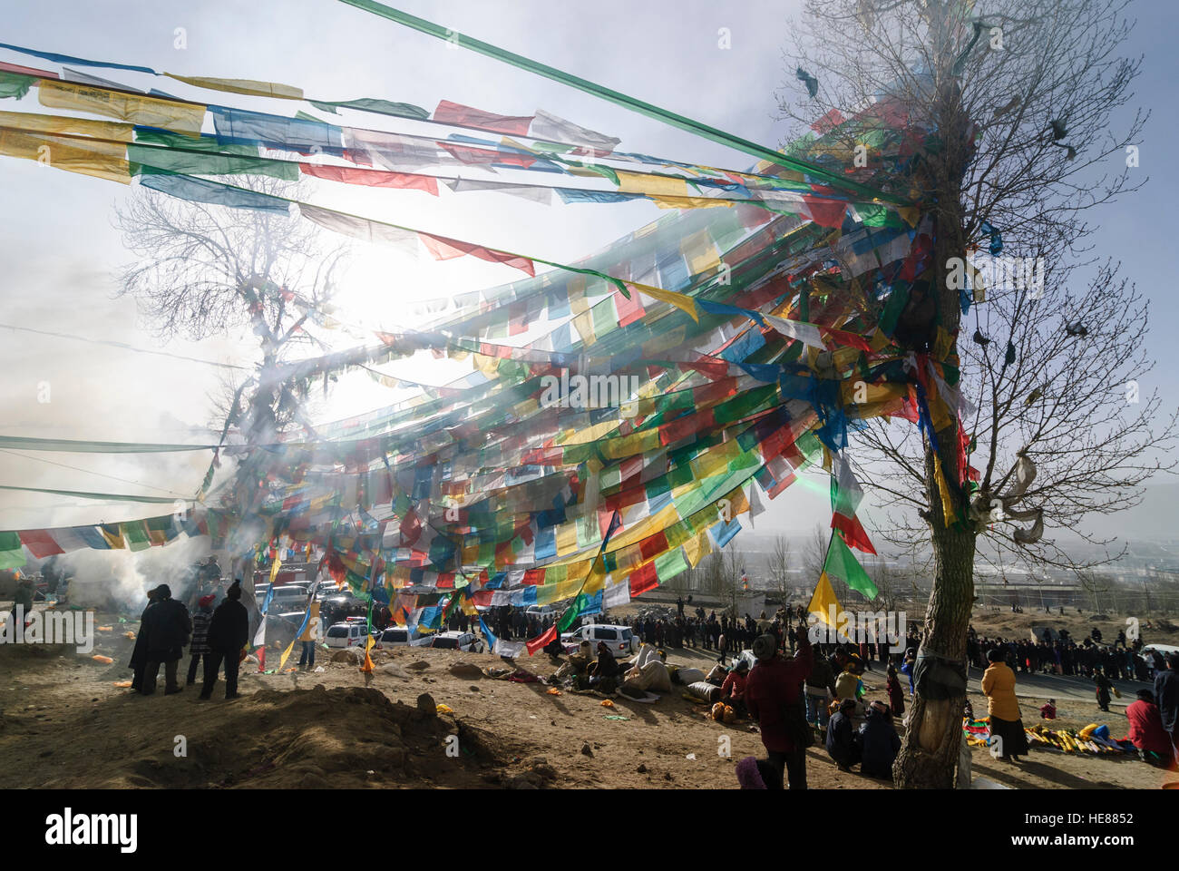 Lhasa: Tibetans attach new prayer flags to the Tibetan New Year (Losar ...