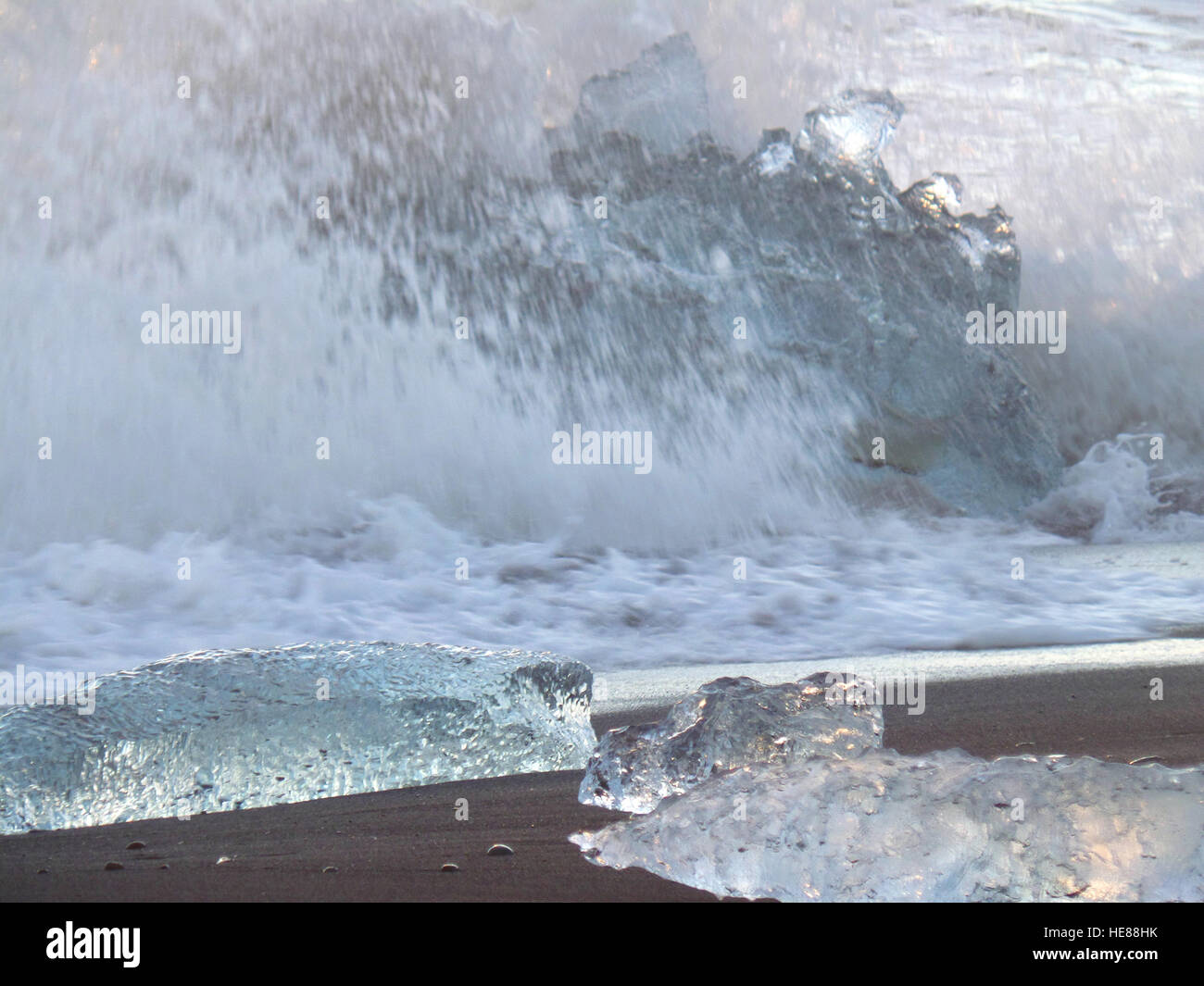Wave hitting iceberg hi-res stock photography and images - Alamy