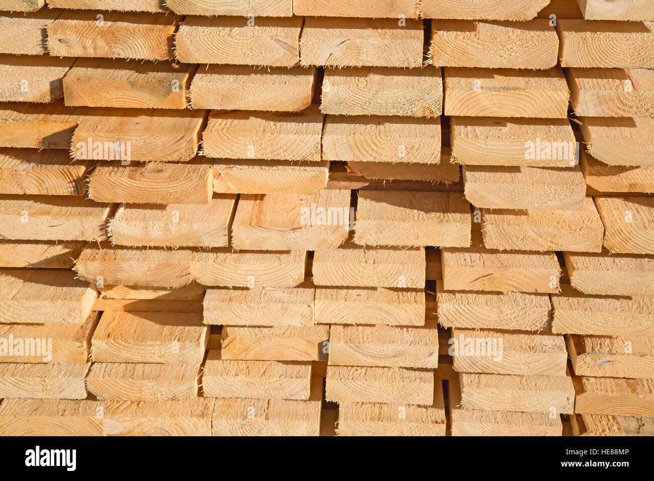 Stack of new wooden studs at the lumber yard Stock Photo - Alamy