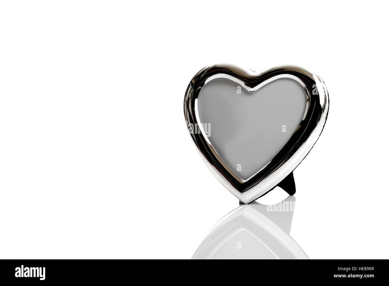 Heart-shaped picture frame Stock Photo - Alamy
