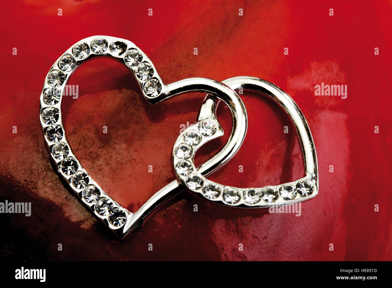 Entwined hearts hi-res stock photography and images - Alamy