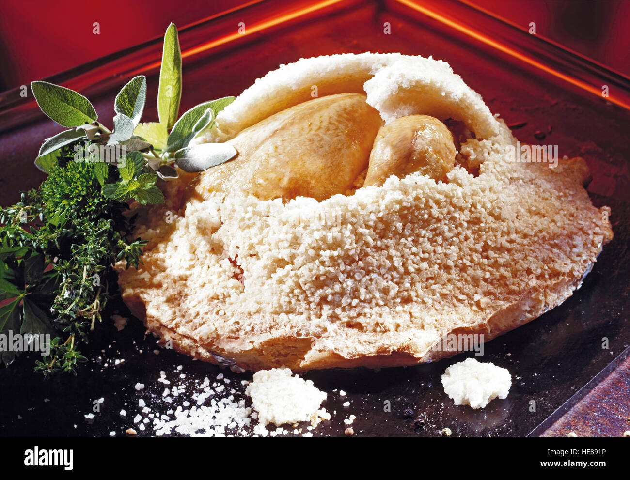 Roast chicken with thyme in tray hi-res stock photography and images ...