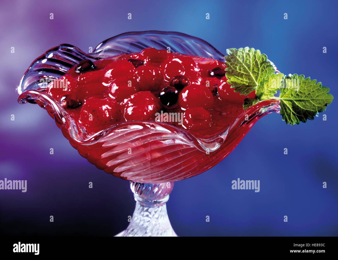 Glass goblet with Rote Gruetze, red fruit pudding Stock Photo - Alamy