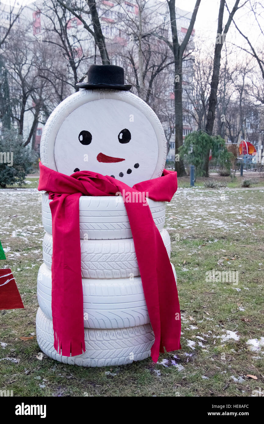 Snowman made from tires Stock Photo - Alamy