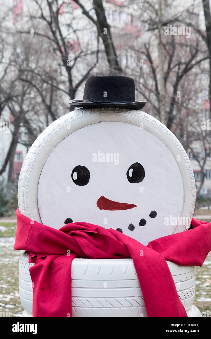 Snowman made from tires Stock Photo - Alamy