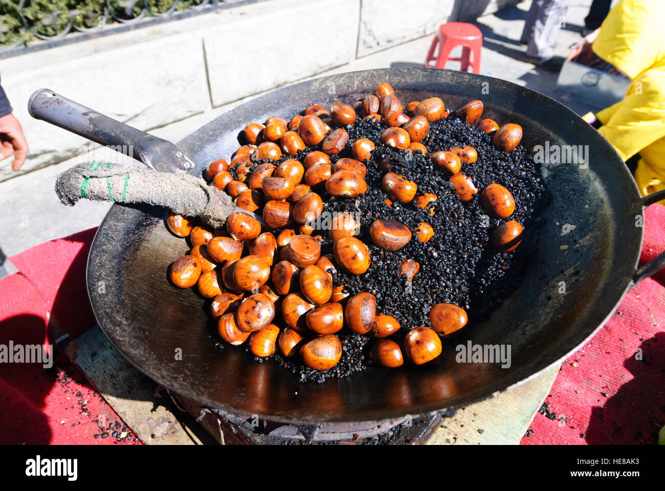 Roasted chestnuts at a snack stand hi-res stock photography and images ...