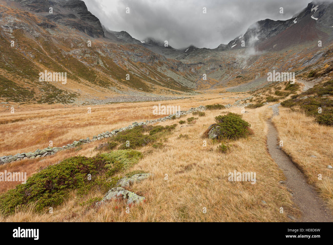 walking at fall in a mountain valley Stock Photo - Alamy