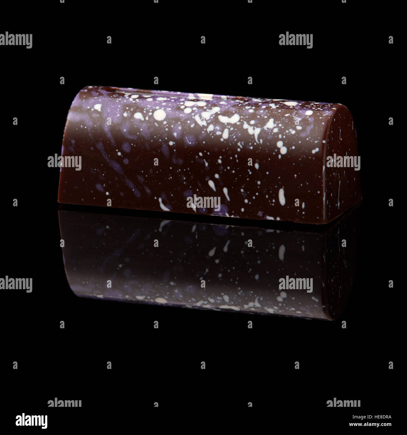 delicious chocolate candy isolated on a black background Stock Photo ...