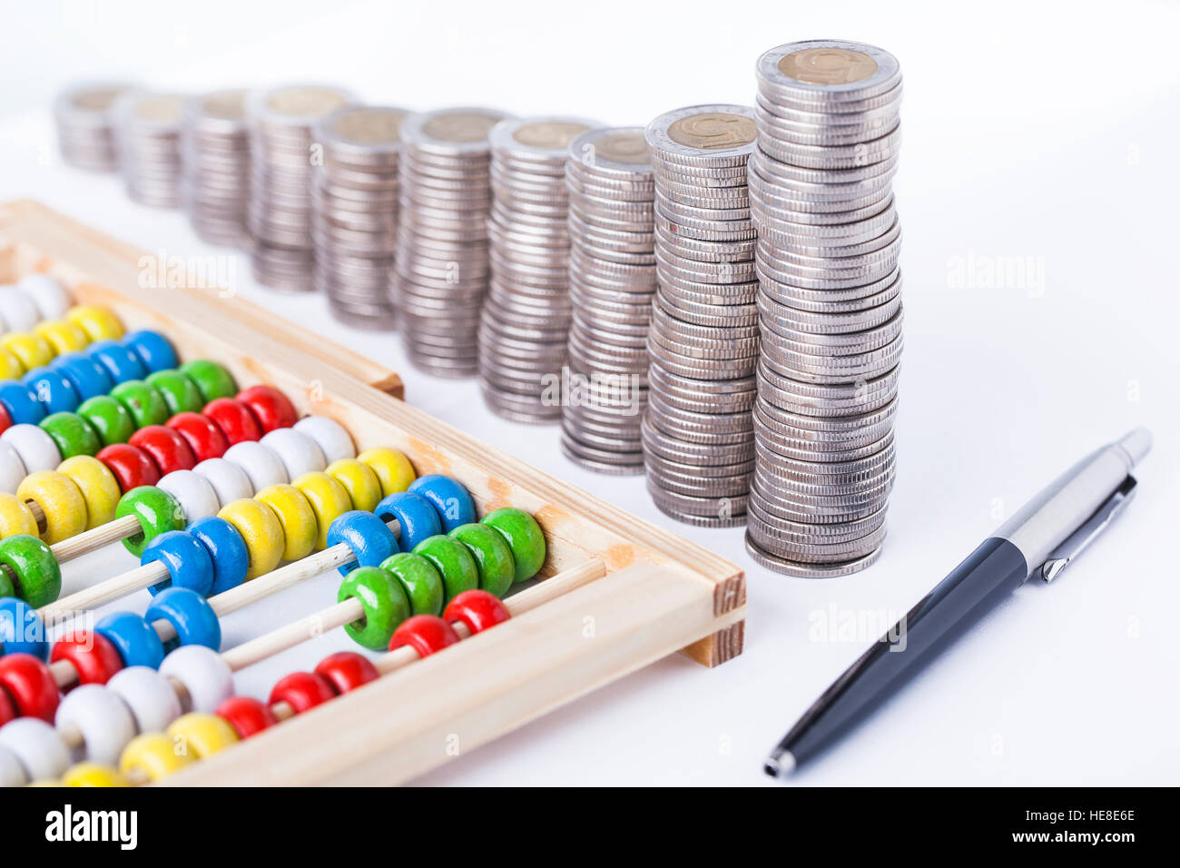 counting income, pile of money, calculator in white background Stock ...