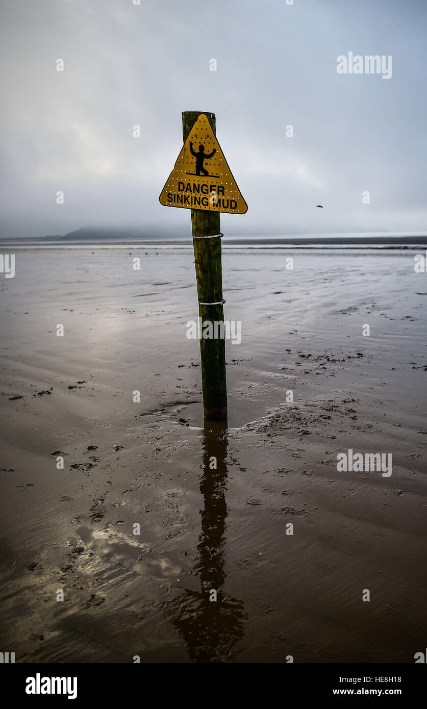 A sign warning of the danger from sinking mud at Weston-super-Mare ...