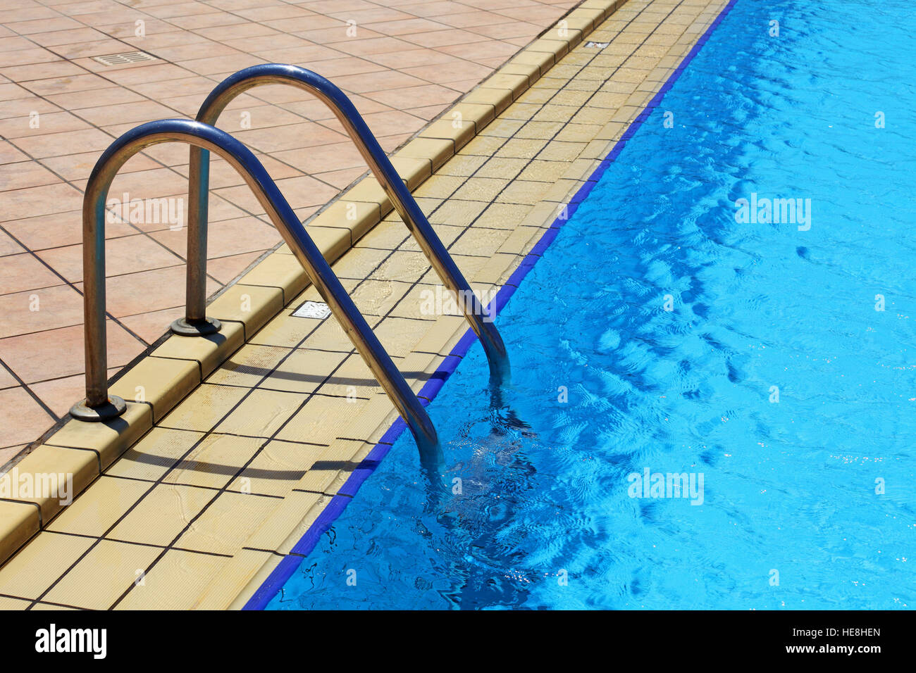 entrance to the swimming pool with metal railings Stock Photo - Alamy