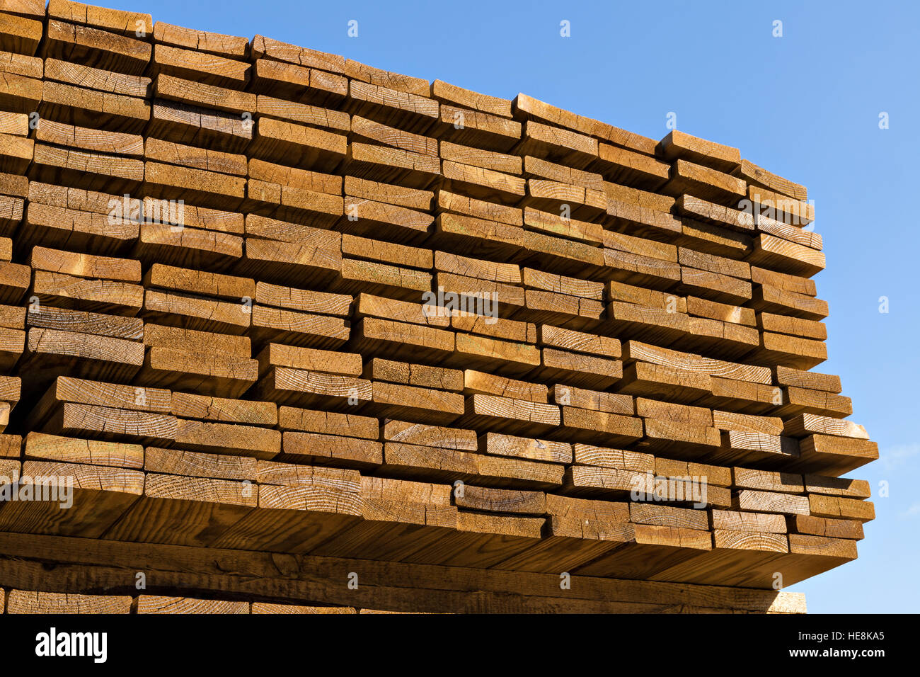 Wooden construction boards stacked close hi-res stock photography and ...