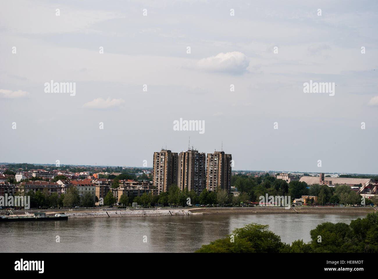 tall buildings by the river Stock Photo - Alamy