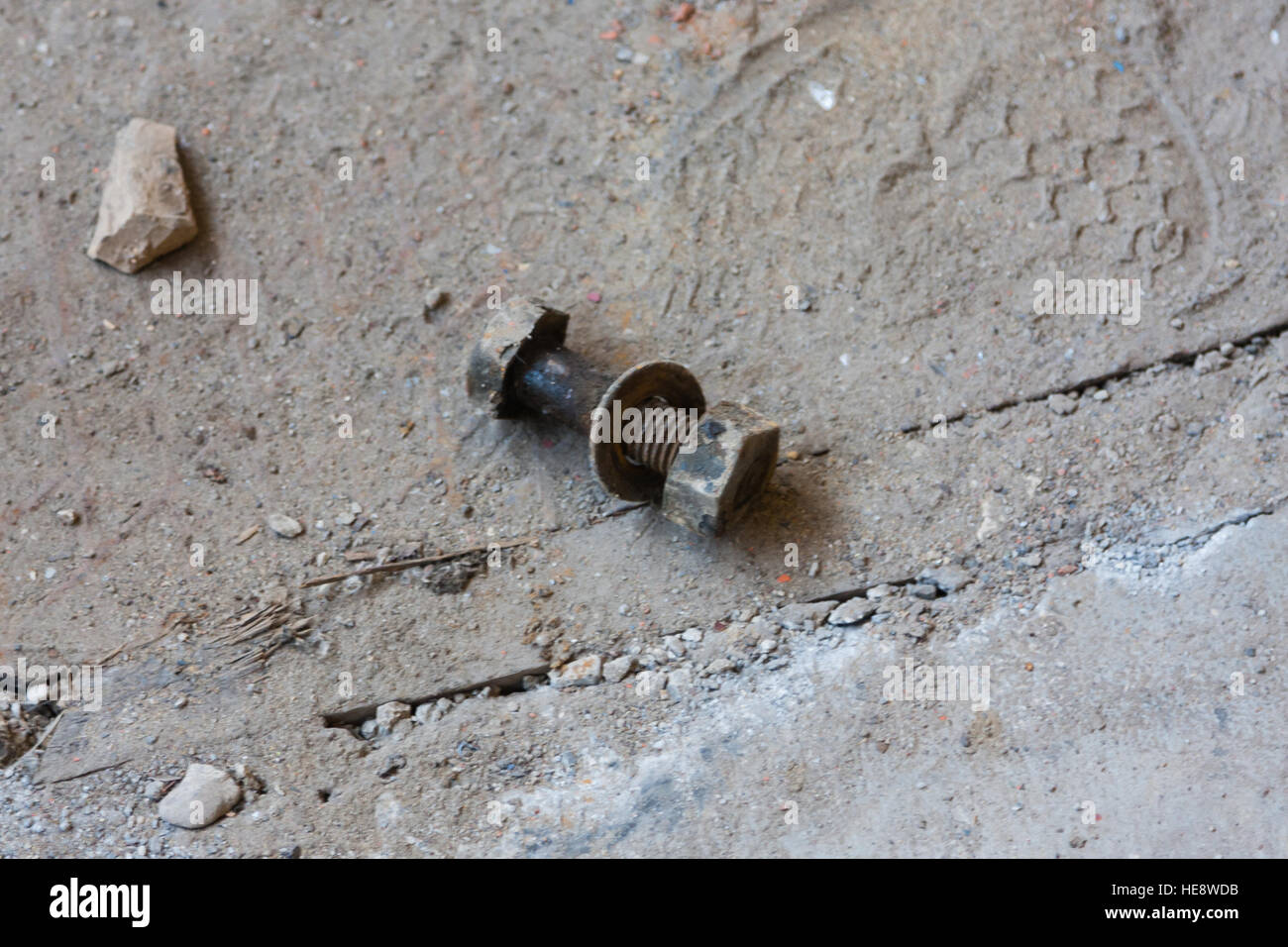 Lost bolt in abandoned steel factory Stock Photo - Alamy
