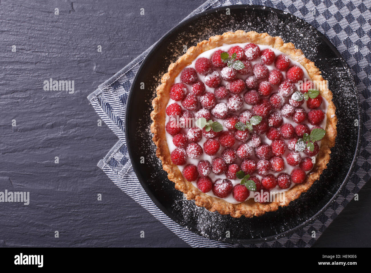raspberry tart with cheese cream on a plate close-up horizontal view ...