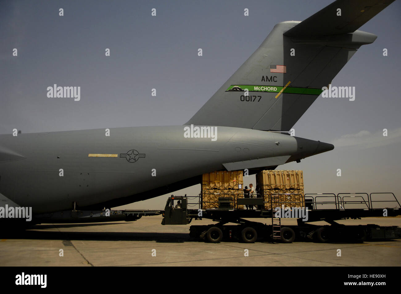 Pallets are loaded on a C-17 Globemaster III at Sather Air Base, Iraq ...