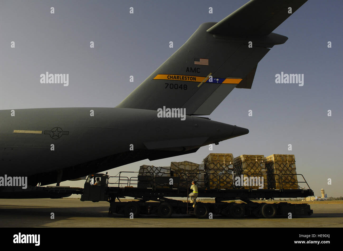 Pallets are loaded on a C-17 Globemaster III from Charleston Air Force ...