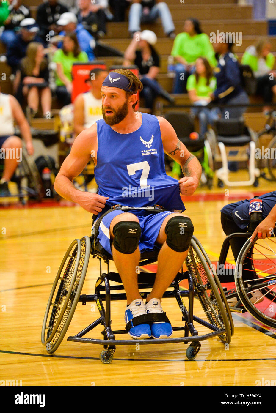 Retired Senior Airman Ryan Gallo adjusts his uniform after being ...