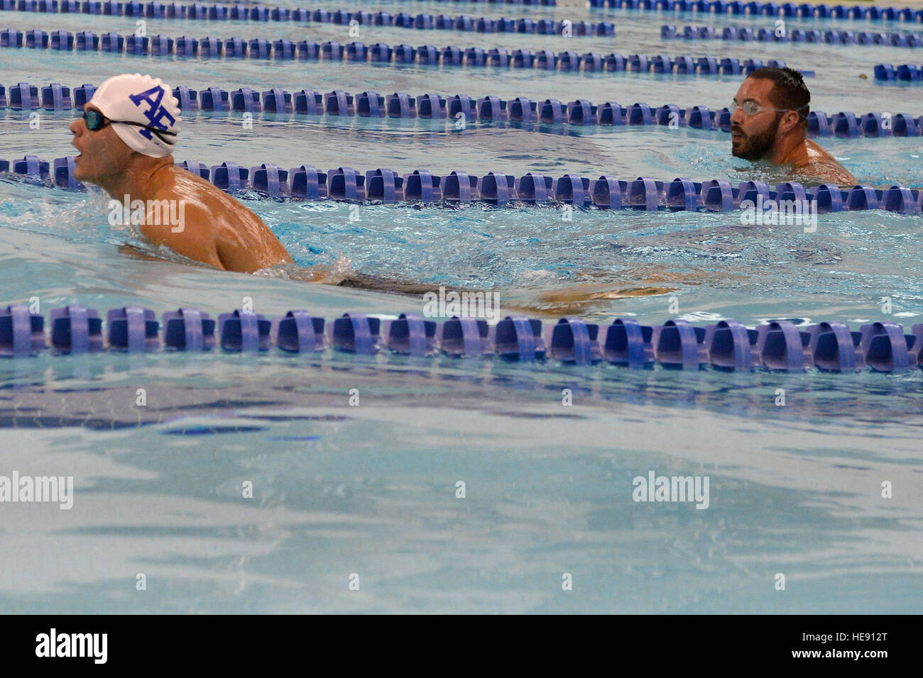 Timothy Babb(left) and Steven Maltis, Wounded Warrior athletes, work on ...