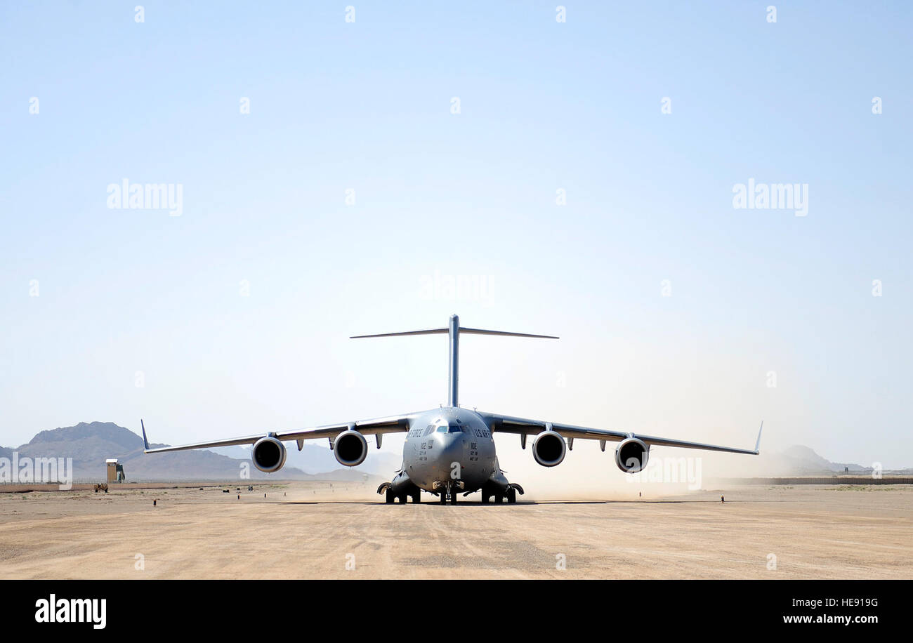 A U.S. Air Force C-17 "Globemaster III" cargo plane lands at the airfileld on Forward Operating ...
