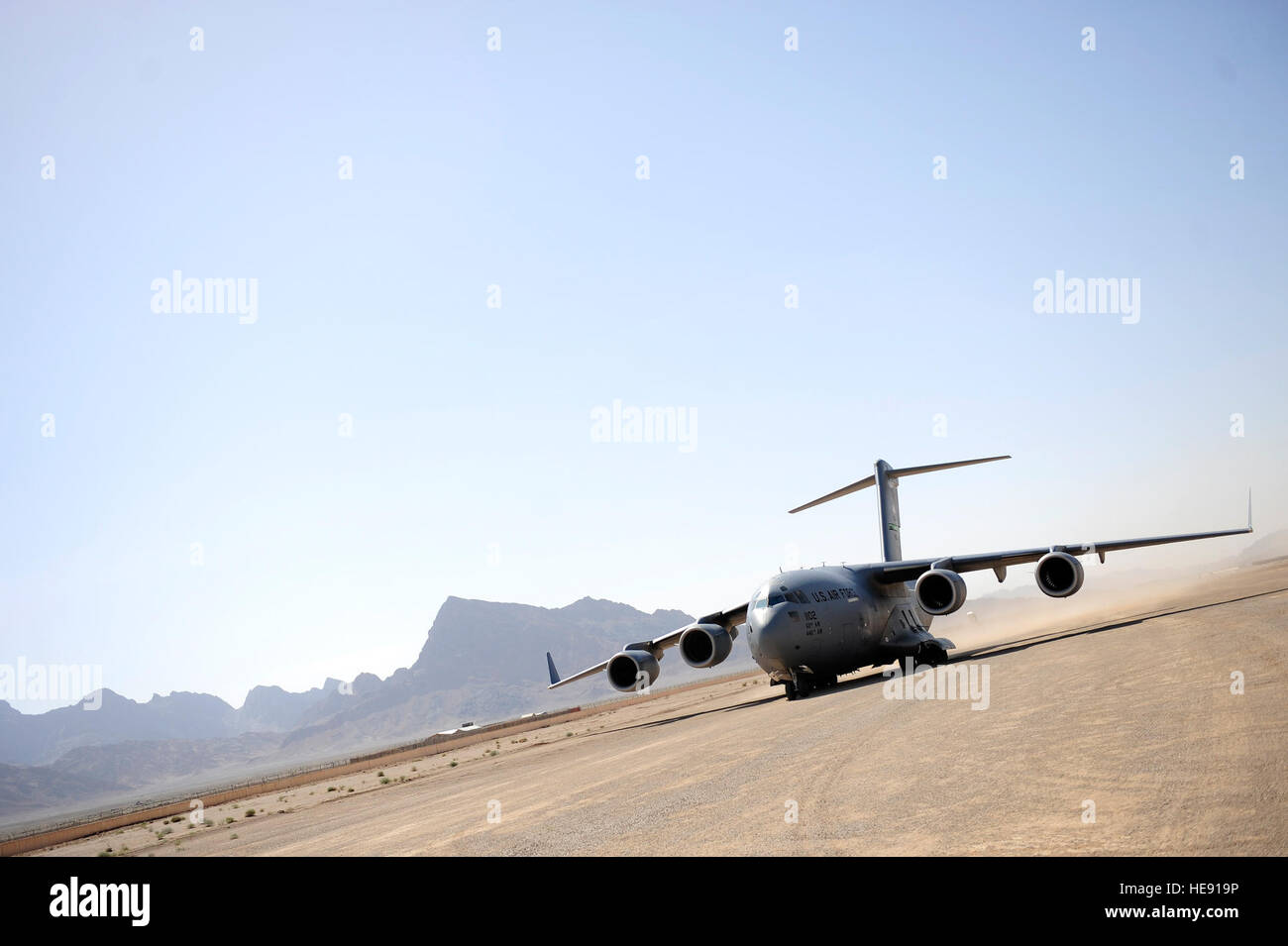 A U.S. Air Force C-17 "Globemaster III" cargo plane lands at the airfileld on Forward Operating ...