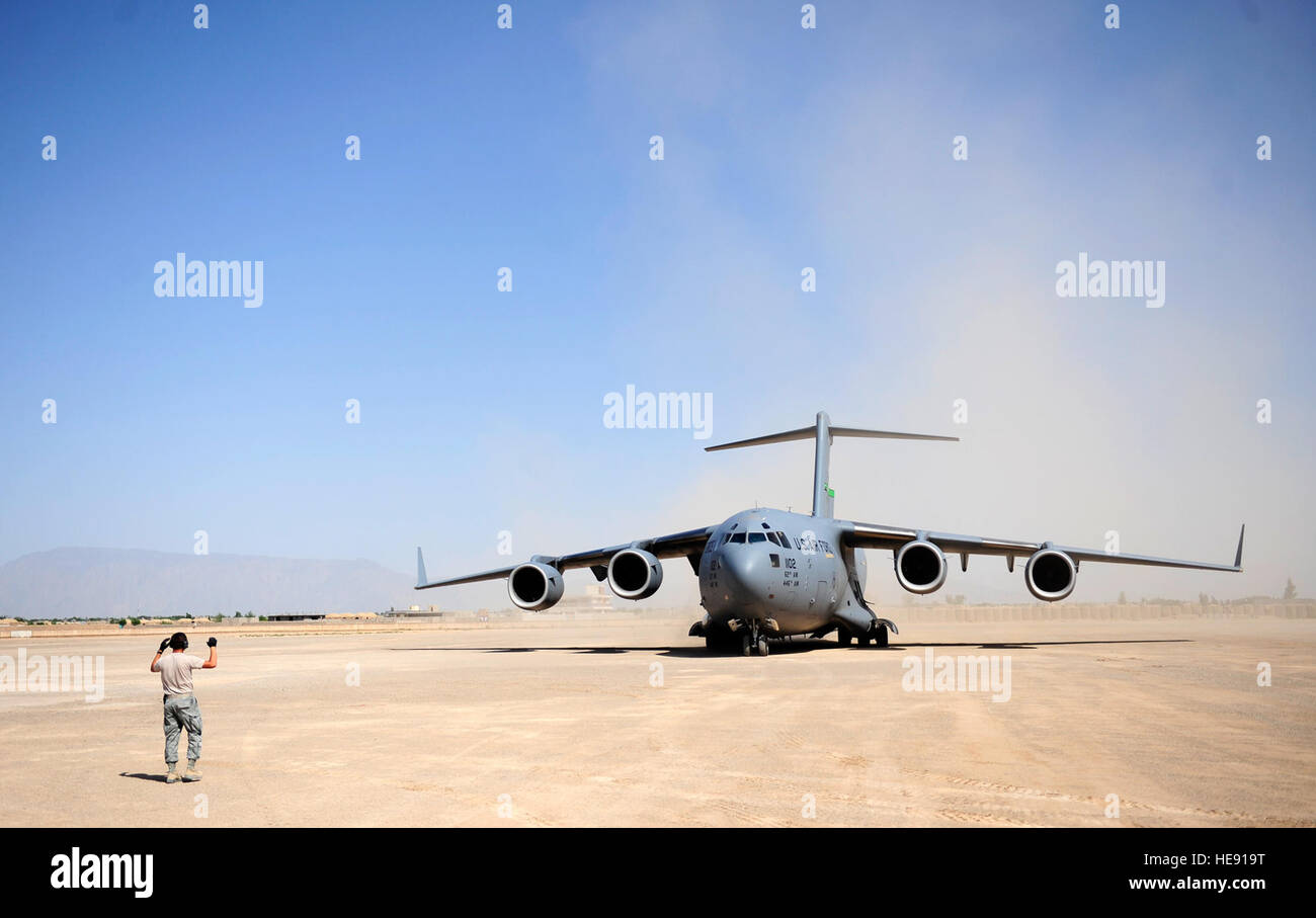 A U.S. Air Force C-17 "Globemaster III" cargo plane taxis to the terminal after landing at the ...