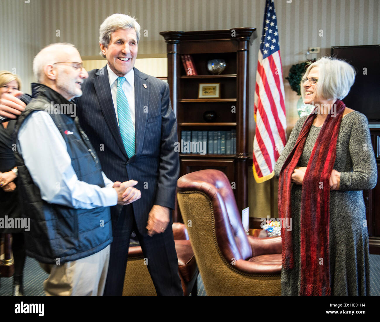Secretary of State John Kerry and Alan Gross embrace upon meeting after ...