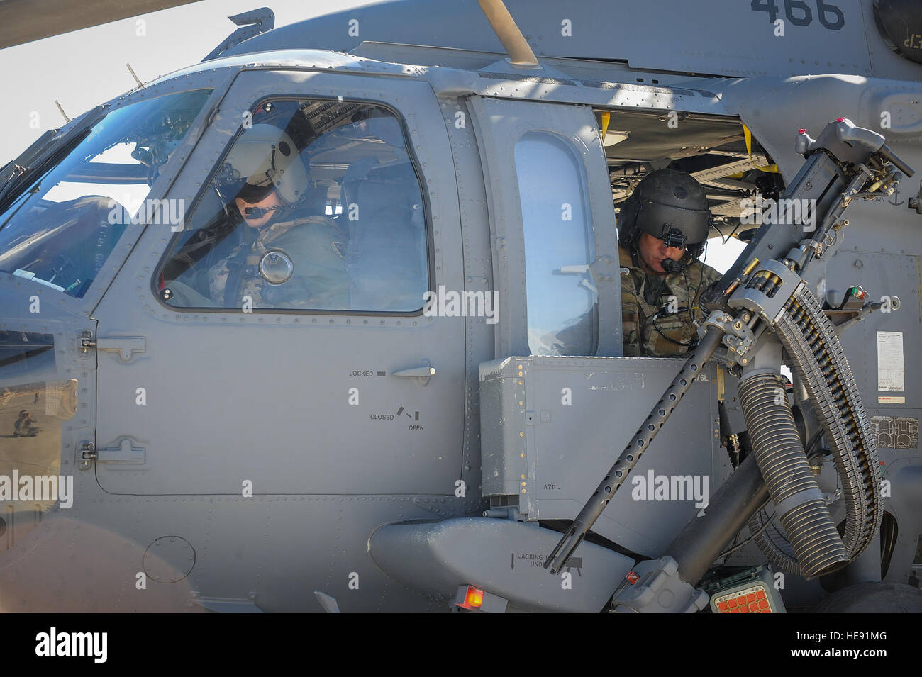 First Lt. Seth Peterson (left), a pilot with the 210th Rescue Squadron ...