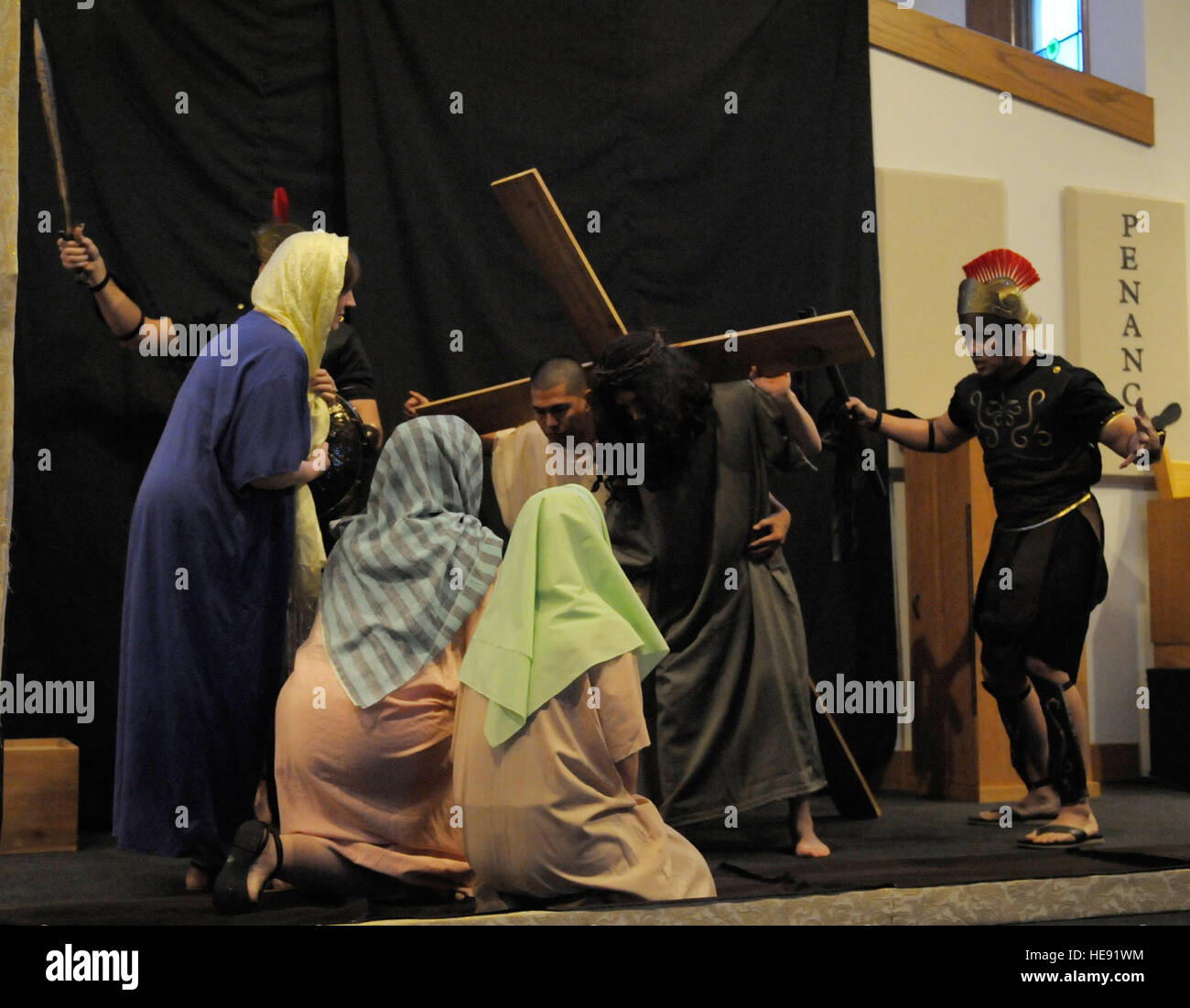 Simon of Cyrene, played by U.S. Air Force Staff Sgt. Jamie Vergara, and ...