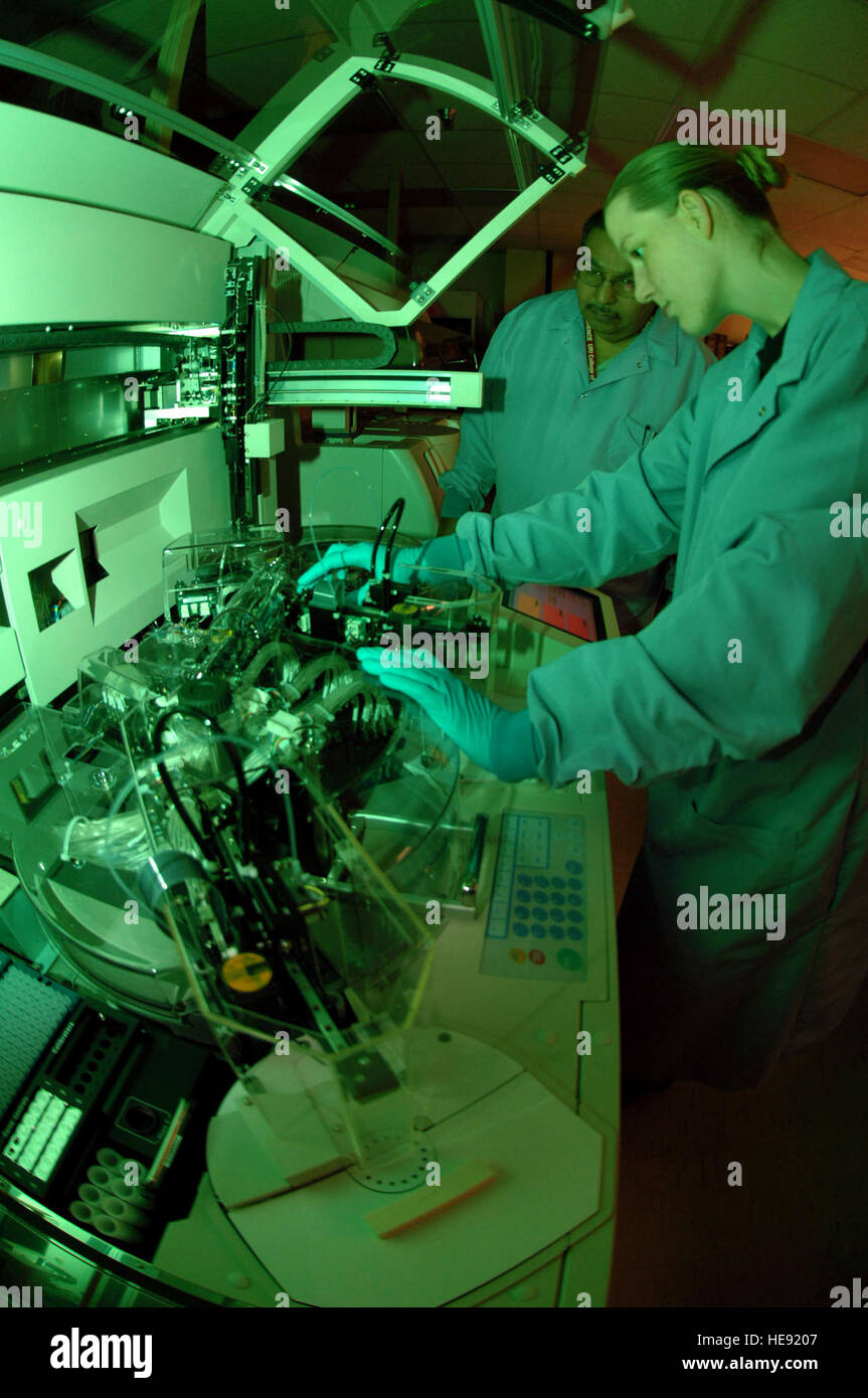 Staff Sgt. Kristin Parsons loads reagents into allergy testing machine ...