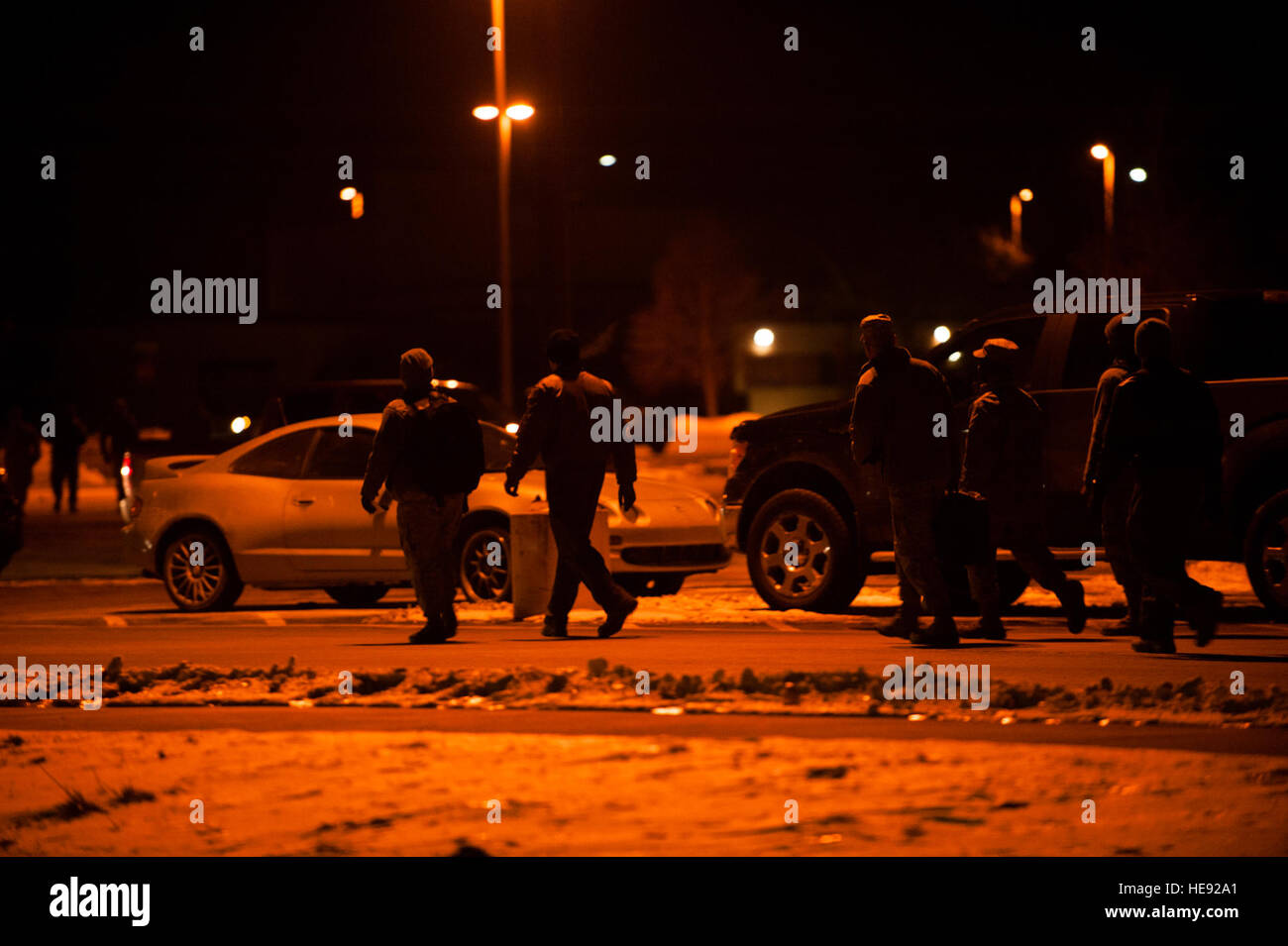 Members of the 618th Air Operations Center evacuate their building ...