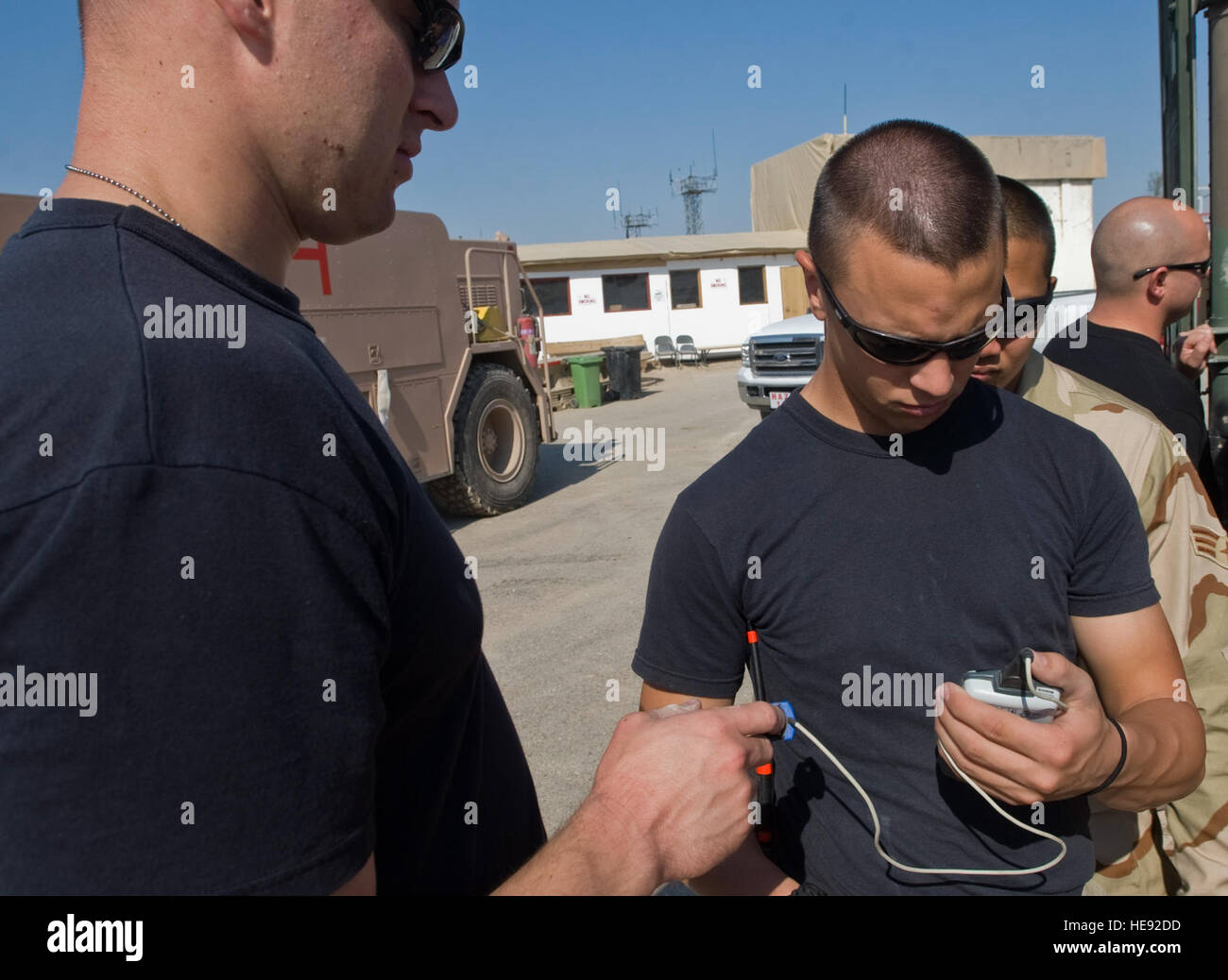 ALI BASE, Iraq –Staff Sgt. Colin Crow (left), and Senior Airman Adam ...