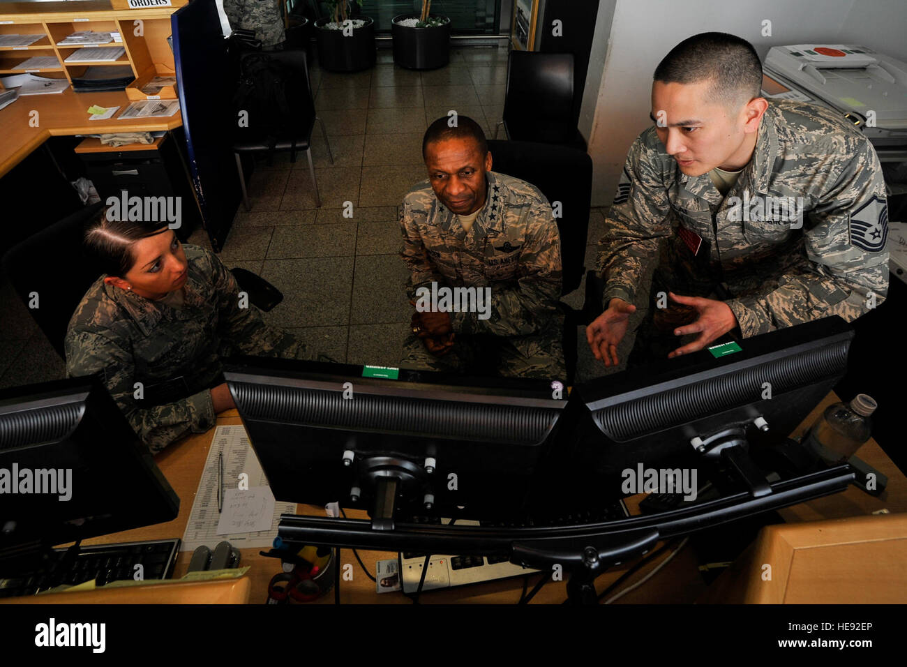 Gen. Darren W. McDew, Air Mobility Command commander, receives a ...