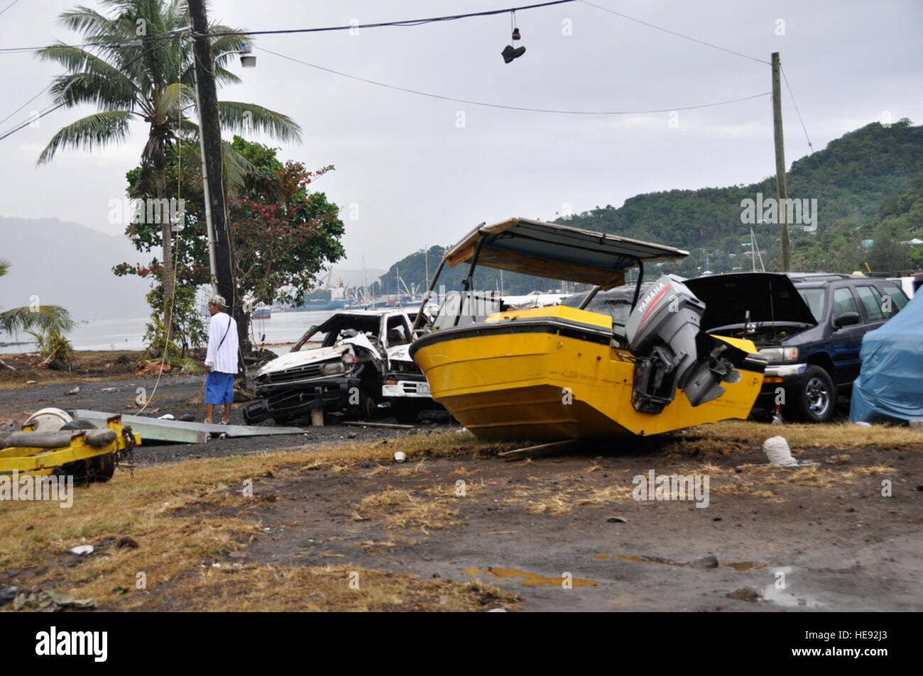 After a tsunami in Pago Pago, American Samoa, a small boat rests among ...