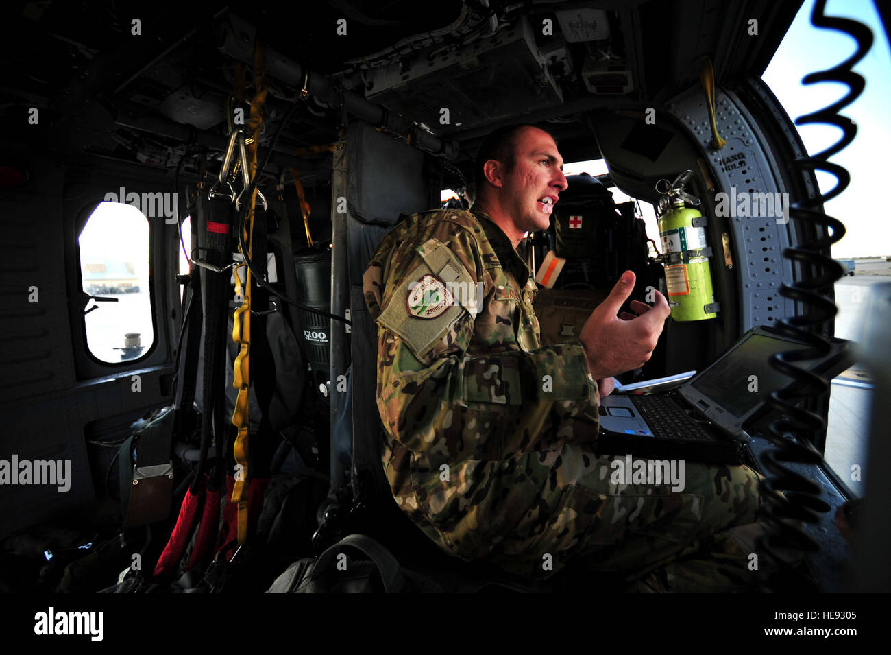 U.S. Air Force Staff Sgt. Justin Larson a HH-60 Pave Hawk flight ...