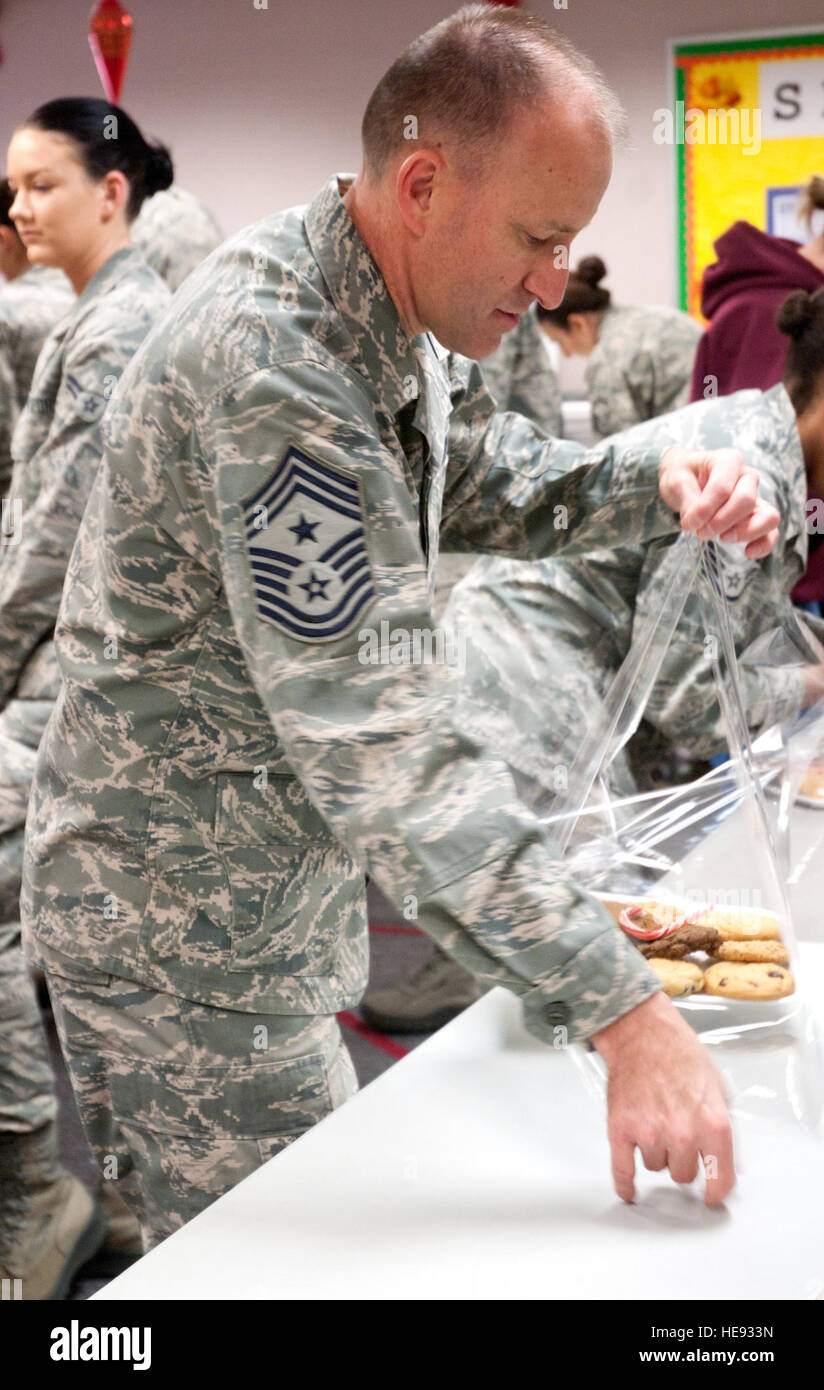 Chief Master Sgt. Samuel Couch, 90th Missile Wing command chief, wraps ...