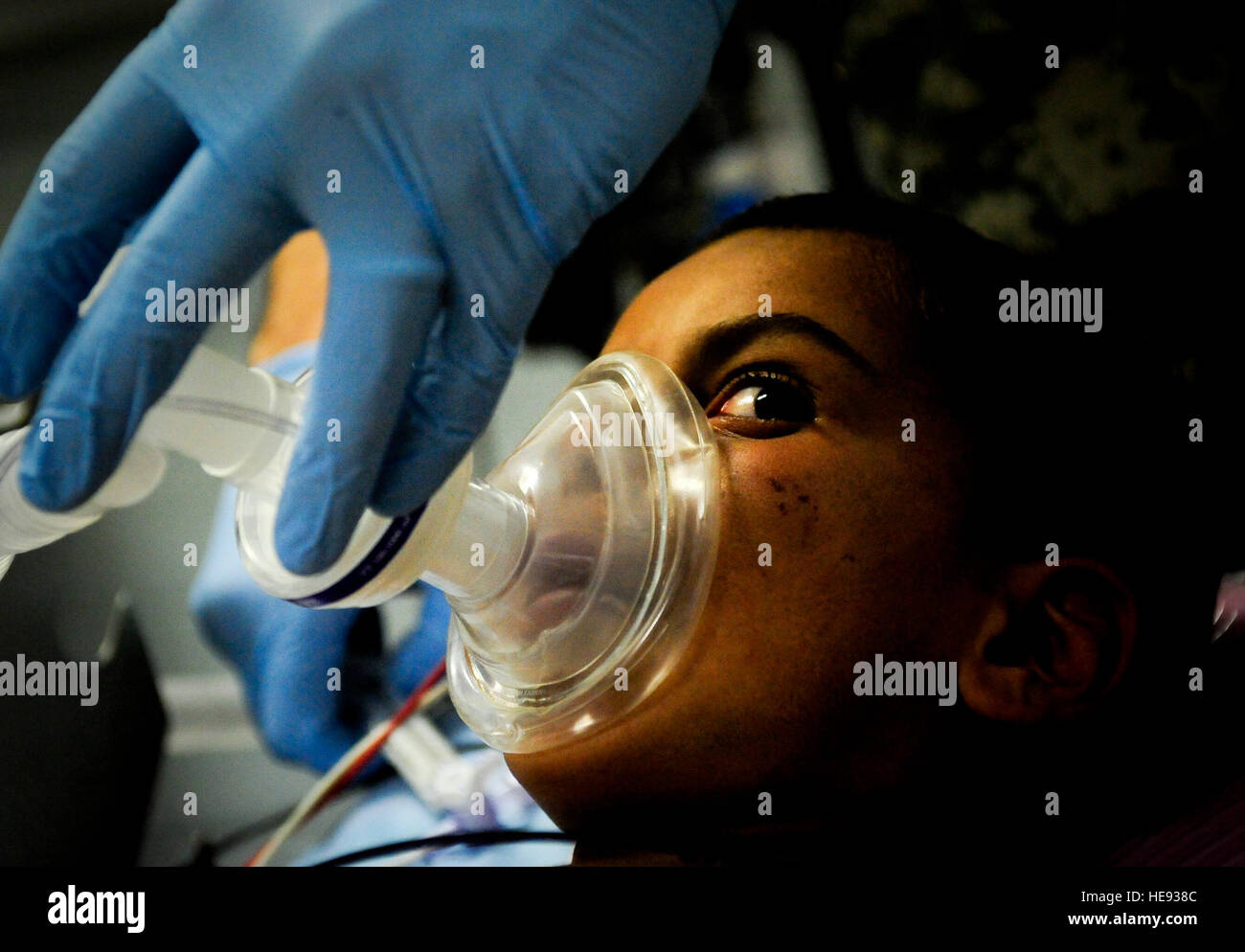 An Afghan child is prepared for anesthesia before undergoing a ...