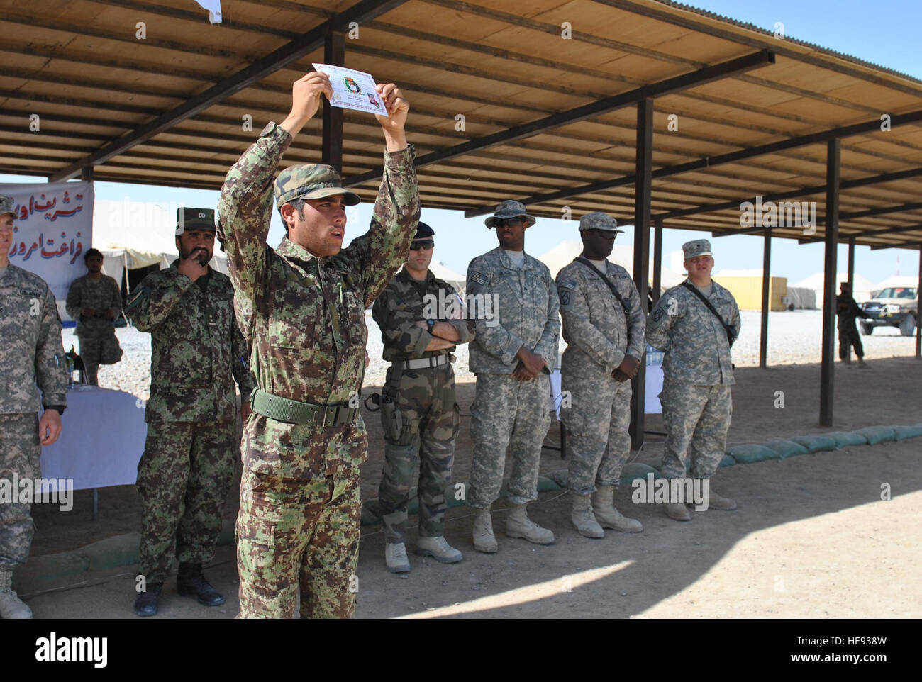An Afghan National Army soldier holds his team leader course graduation ...