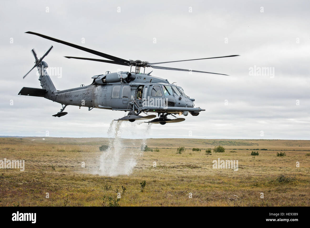 An HH-60 Pave Hawk helicopter from the 210th Rescue Squadron takes off ...
