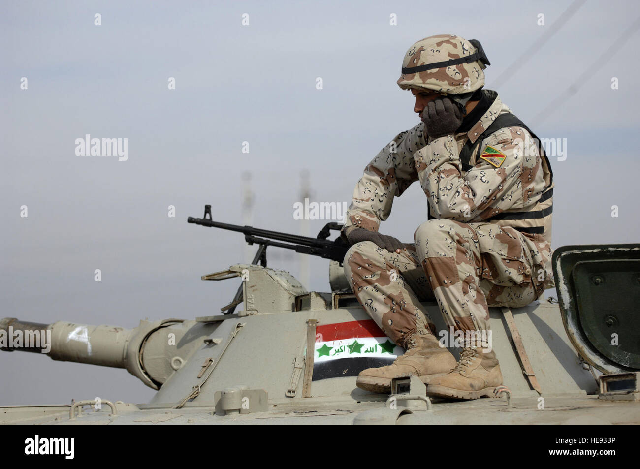 An Iraqi army soldier from 9th Iraqi Army Division (Mechanized) takes a ...
