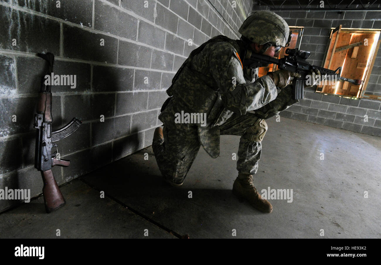 Spc. Greg Hadley, assigned to the 164th Military Police Company, 2nd ...