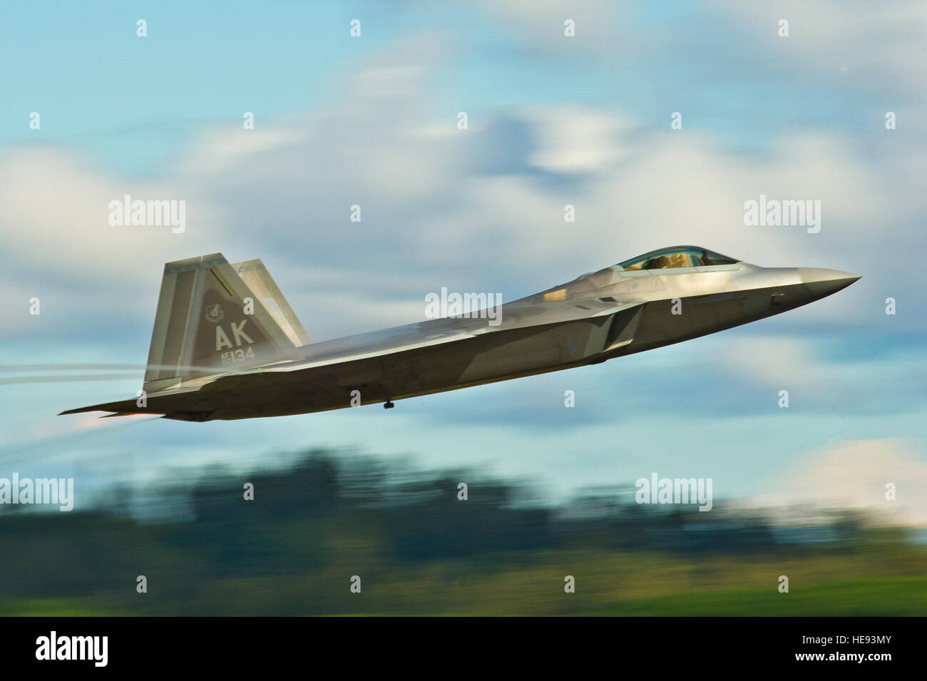 A U.S. Air Force F-22 Raptor fighter jet from the 90th Fighter Squadron ...