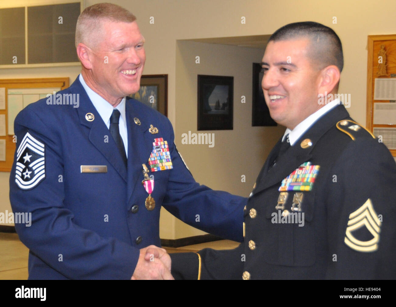 Chief Master Sgt. Shane Clark is congratulated by Sgt. 1st Class ...