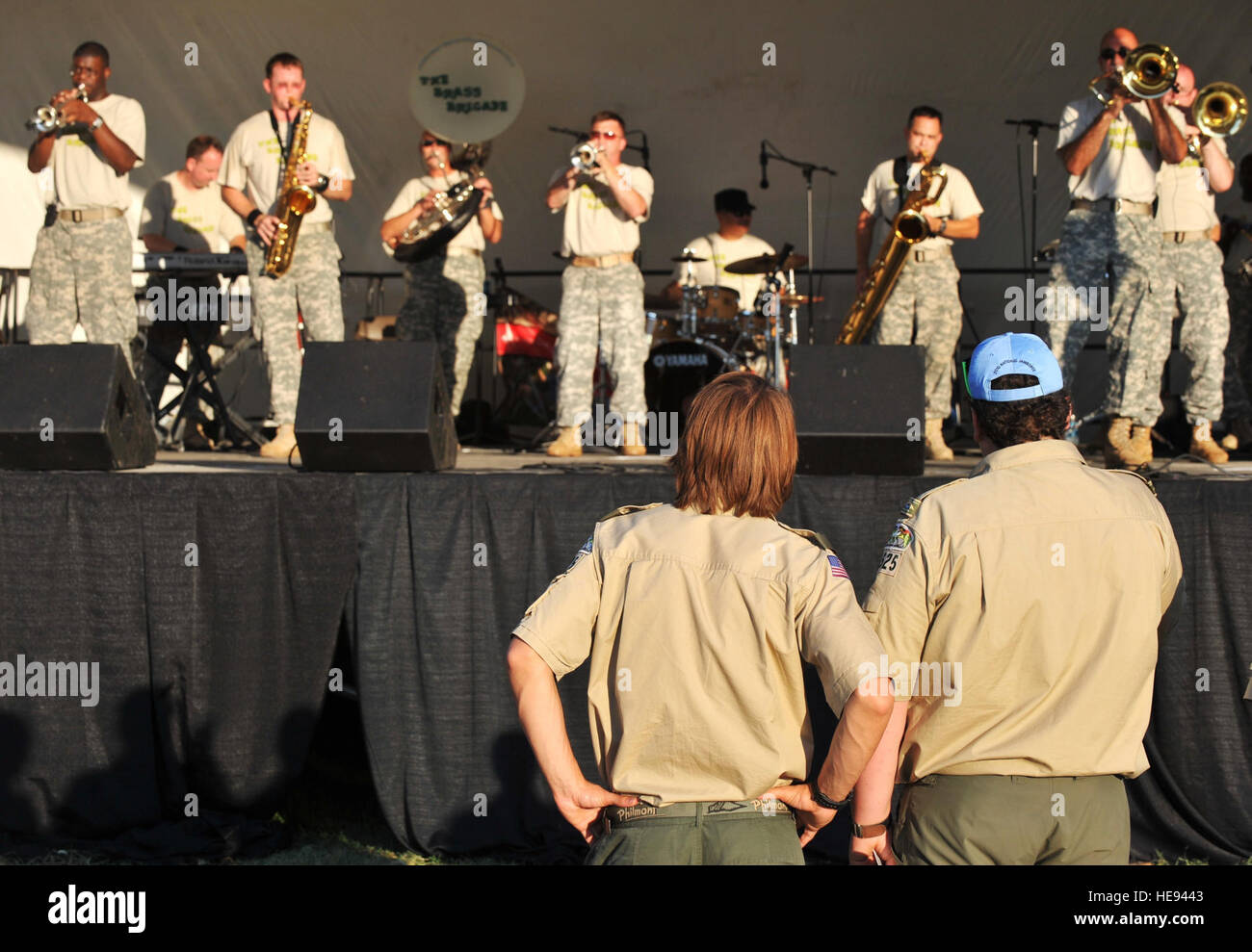Two Boy Scouts watch as the U.S. Army Ground Forces Band plays during a ...