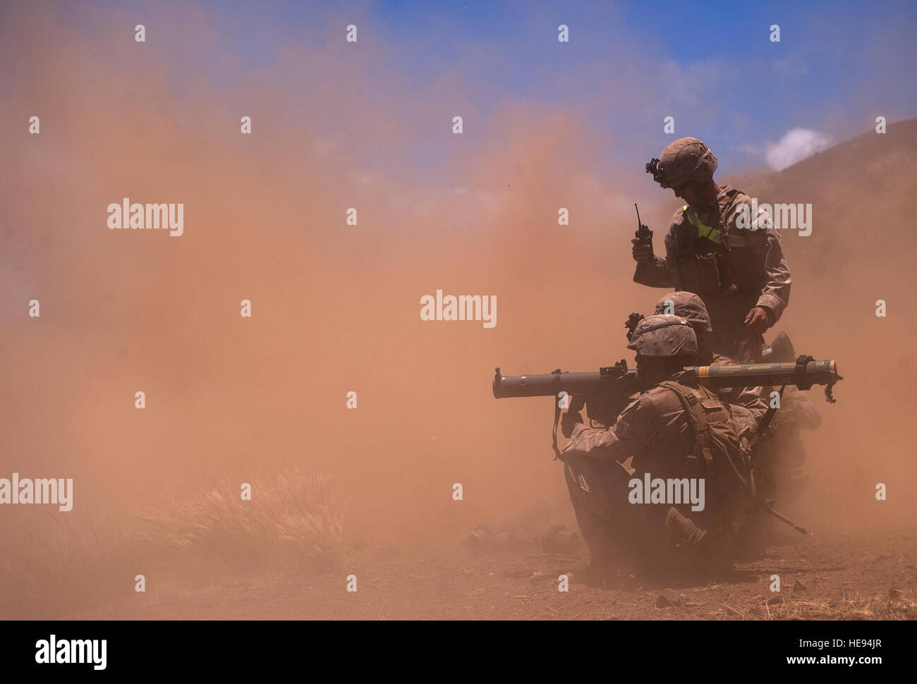 U.S. Marines of the 3rd Marine Regiment fire an AT-4 anti-tank weapon ...